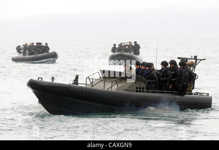 Royal Navy rapid response ribs, boat, speedboats carrying troops from ...