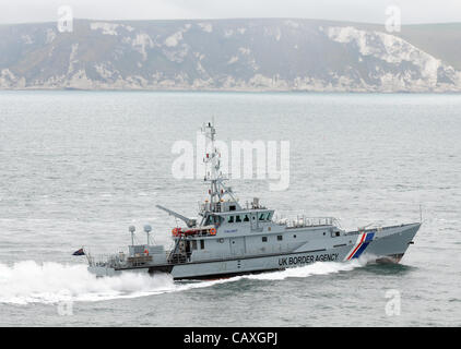 UK Border Agency customs cutter HMC Valiant passes the Stone Pier ...