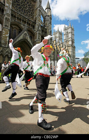 Woodside Morris Men dance at a traditional English village fete in St ...