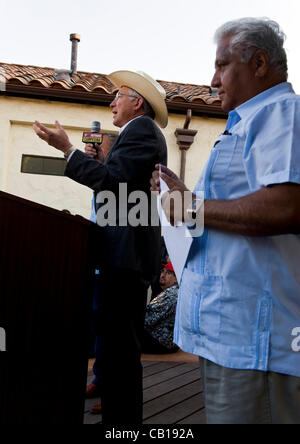 Interior Secretary Ken Salazar looks off the helo pad into the waters ...