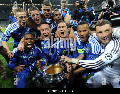 Chelsea players celebrate with the trophy after the final whistle the ...
