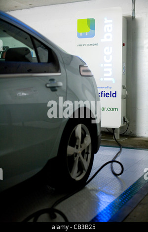 A Juice Bar electric car charging station Stock Photo - Alamy
