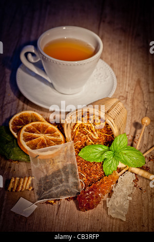 tea time set with flavors on wooden background Stock Photo - Alamy
