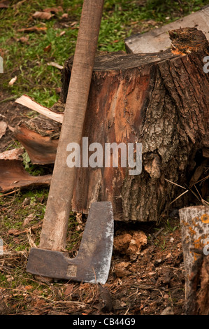 Old heavy axe tool with wood scrap Stock Photo - Alamy