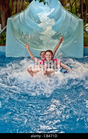 Girls on a waterslide Stock Photo - Alamy