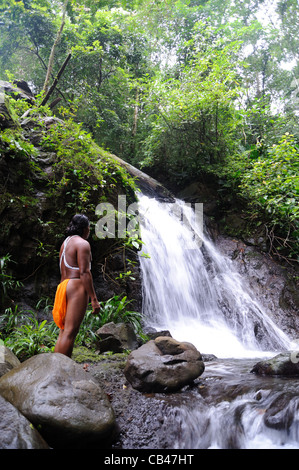 Embera Puru indian man in the forest outside the Embera Puru village, Rio Pequeni, Republic of ...