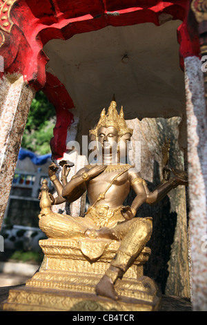 Small Buddha shrine on tree at Wat Tham Seua (Tiger Cave) temple, Krabi ...