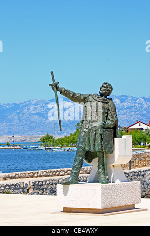 Sculpture of Duke Branimir on entrance to the city of Nin Stock Photo ...