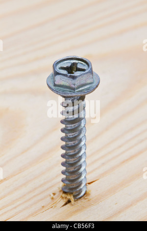 big metal screw on a white background Stock Photo - Alamy