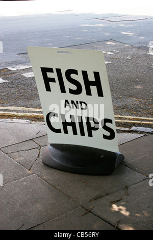 eat fish and chips poster Stock Photo - Alamy