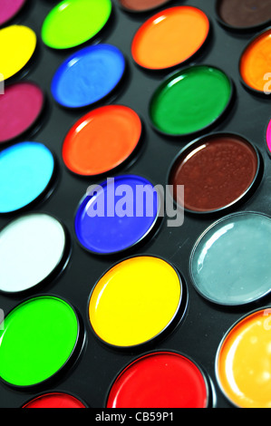 A set of watercolors of different colors for painting. Multi-colored ...