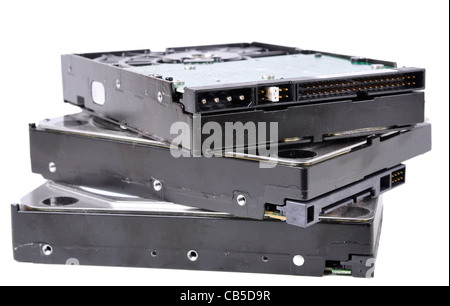 Hard drives pile isolated in white background Stock Photo - Alamy