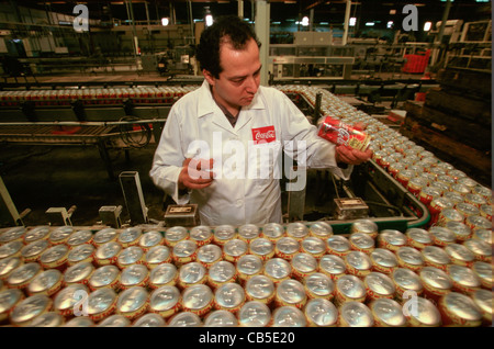 Man in the Coca-Cola factory in Radzymin, Poland Stock Photo - Alamy
