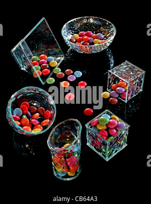 Close up of a pile of Smarties, multi-coloured, crispy-shelled ...