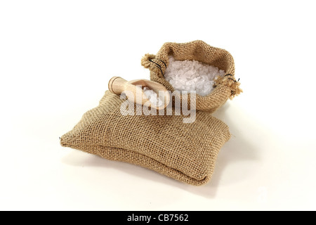 coarse salt grains on a bushel with salt in the bag Stock Photo - Alamy