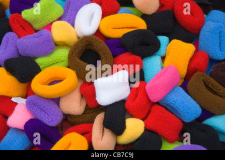 Colorful elastic hair bands on white background Stock Photo - Alamy
