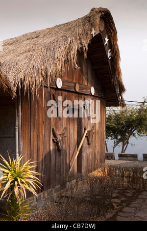 India, Nagaland, Tuophema, traditionally carved wooden Kharu gate ...