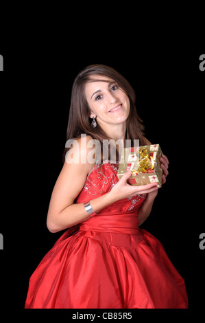 Beautiful Christmas woman with present isolated Stock Photo - Alamy