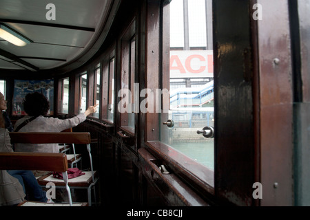 passenger inside star ferry hong kong Stock Photo - Alamy