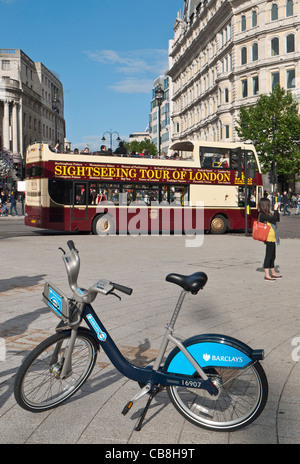 TFL London hire bike parked in Trafalgar Square with cyclist ...