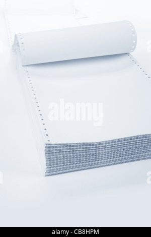 Perforated Computer Paper for background Stock Photo - Alamy