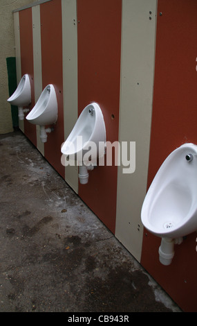 row of outdoor urinals men public toilet,Closeup white urinals in men's ...