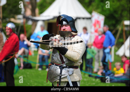 The re-enactment of a medieval scene at Salisbury, Wiltshire, England ...