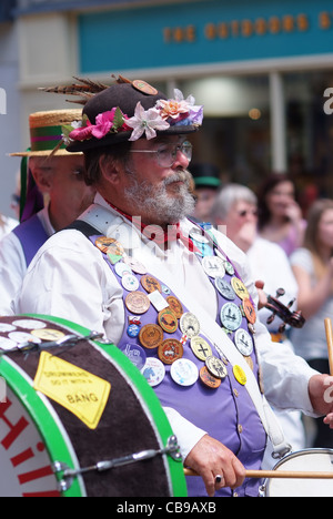 Morris dancers performing in the town centre of Stroud, Gloucestersnire ...