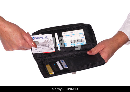 Woman taking credit card of the purse Stock Photo - Alamy
