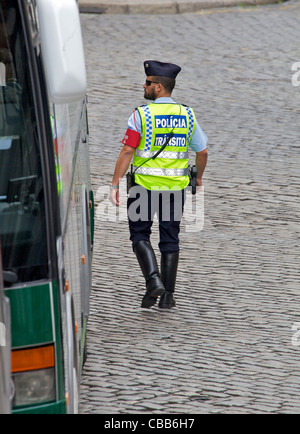 Police officer conducting security check in airport making sure doors ...