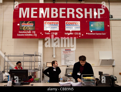 Costco wholesale warehouse membership counter with sign indicating ...