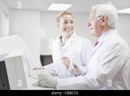 Scientists working in pathology lab Stock Photo - Alamy