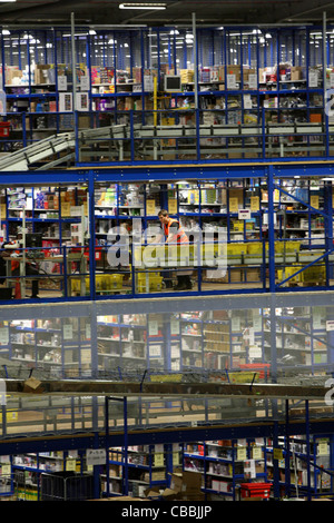 WORKERS SORTING CHRISTMAS PRESENTS AT THE AMAZON WAREHOUSE IN MILTON ...