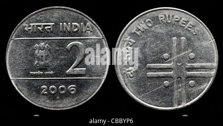 Two rupee coin of India isolated on black background. Map of India as a ...