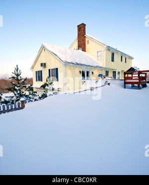 Typical colonial style house in deep snow and ice Stock Photo - Alamy