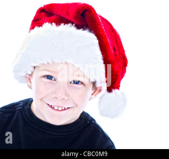 Portrait of cute smiling boy wearing army soldier costume while sitting ...