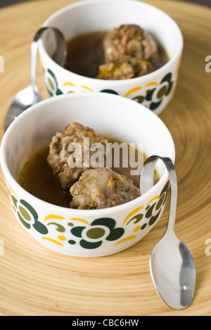 Poached meatballs with sage and lemon Stock Photo - Alamy
