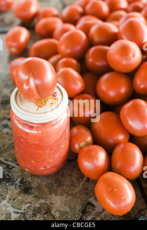 image of tomatoes in jars prepared for preservation Stock Photo - Alamy
