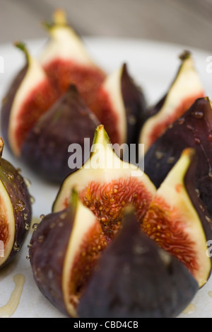 Selective focus shot of fig dessert with vanilla ice cream ...