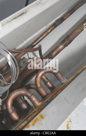 close up image of broken compressor in freezer Stock Photo - Alamy