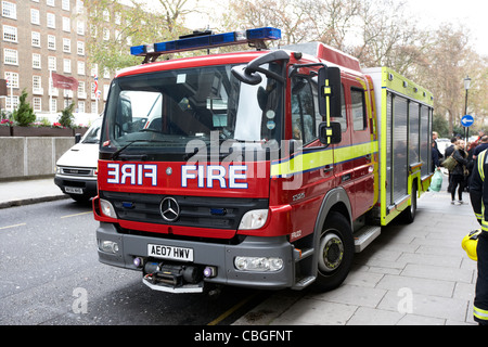 london fire brigade fru vehicle and firemen at three light callout ...