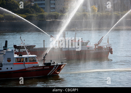 Fireboat, on river Rhine, during an exercise. Bonn, Germany Stock Photo ...