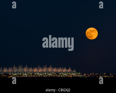 Full moon over the Denver International Airport in Colorado Stock Photo ...