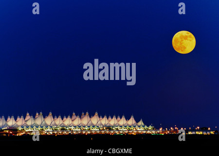 Full moon over the Denver International Airport in Colorado Stock Photo ...