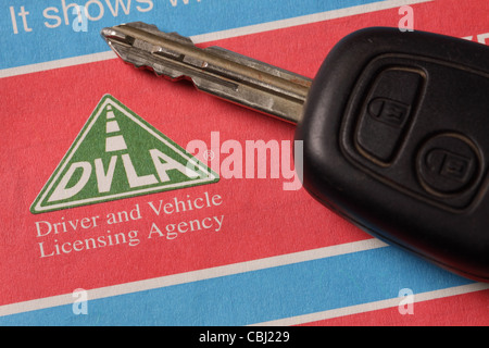 The new red DVLA V5C car registration certificate which replaces the old blue one Stock Photo ...