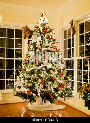 Beautiful Decorated Christmas tree on a darl background Stock Photo - Alamy