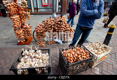 French onion seller on street outside shop to let in Brecon Powys Stock ...