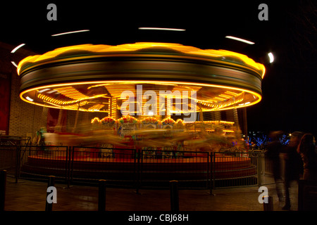 Carousel in motion at night Dublin, Ireland Stock Photo - Alamy