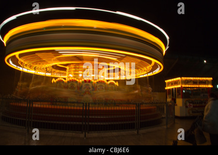 Carousel in motion at night Dublin, Ireland Stock Photo - Alamy