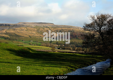 Austwick Beck with Studrigg Scar and Long Scar in the background winter ...
